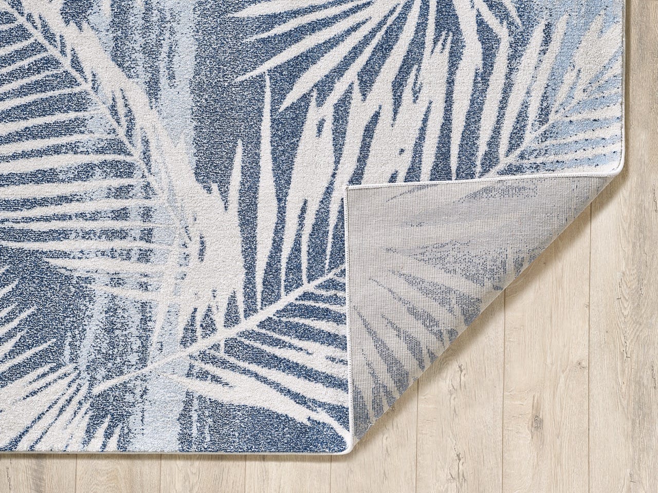 Stella Blue Palms Area Rug at Futonland